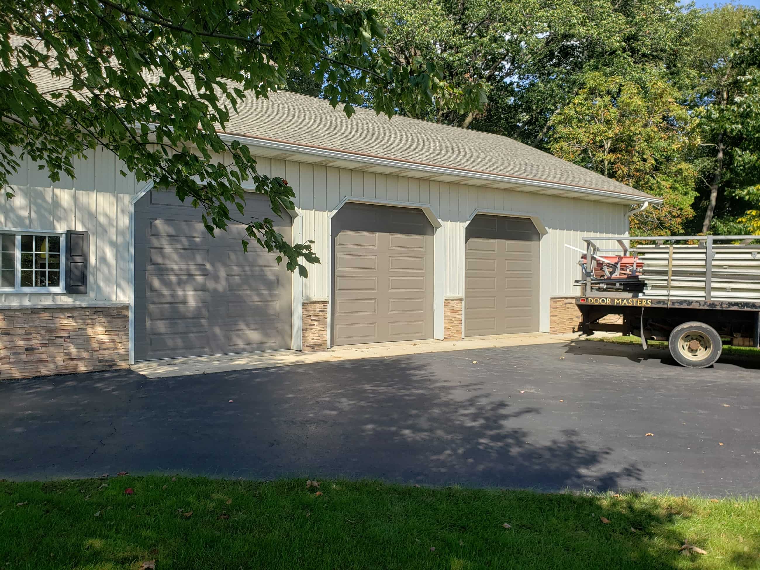 Clopay Model 4310 in Bronze | Commercial Installation | Door Masters ...