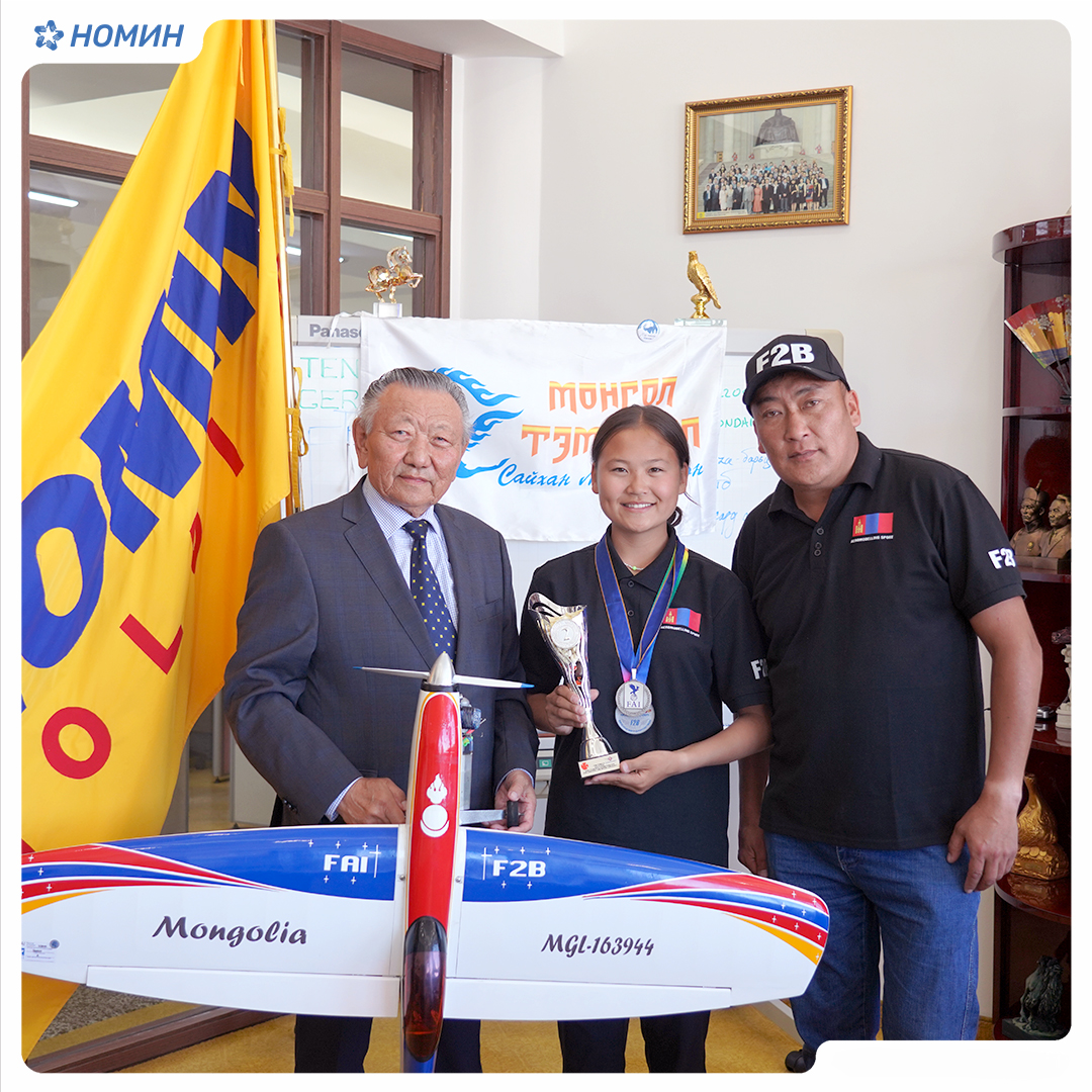 Nomin Holding - Н.Номин охин нисэх загварын спортын ДАШТ-ээс мөнгөн ...