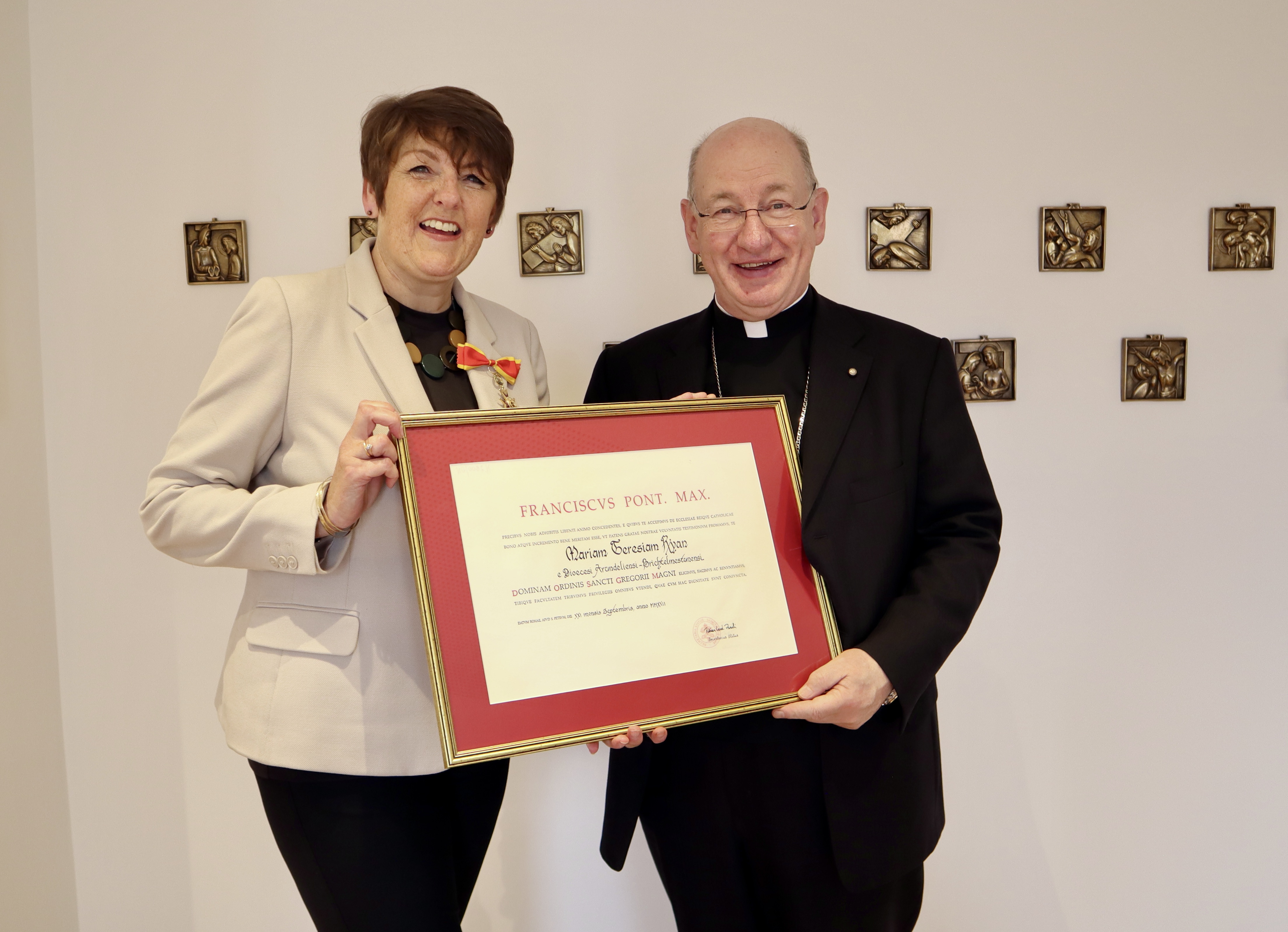 Bishop Richard presented the award to Marie Ryan. | News