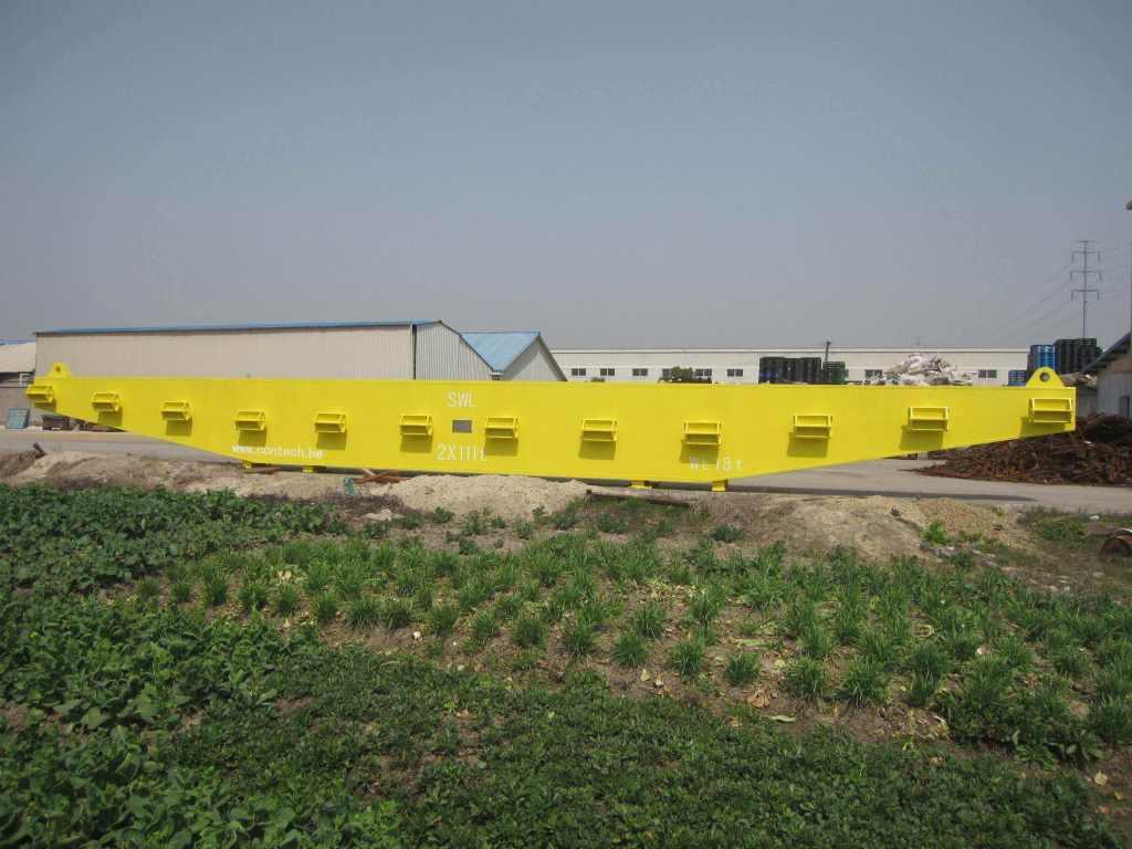 Cargo and container lifting beams and spreaders