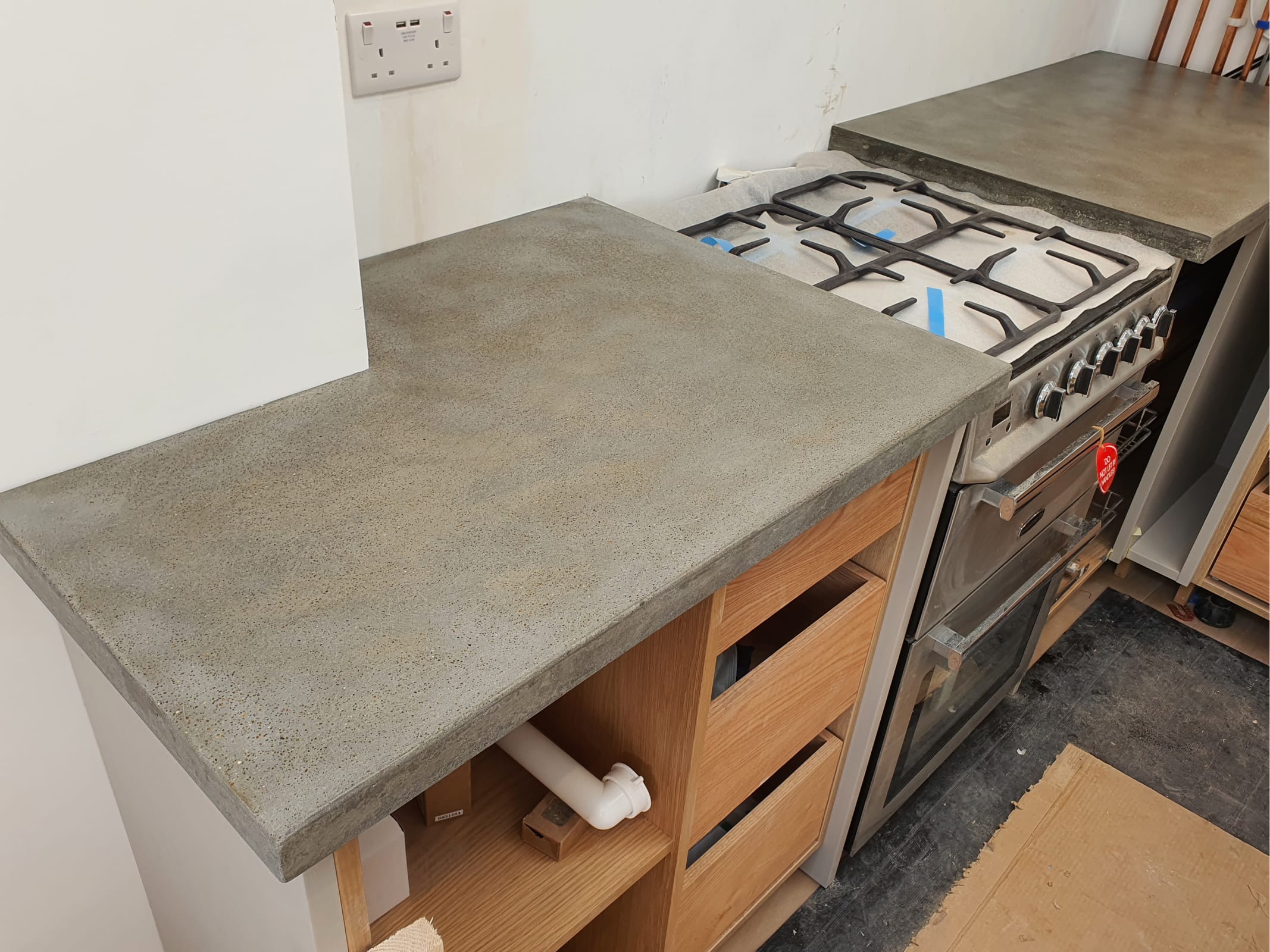 Bespoke kitchen worktops - cement grey with aggregateLondon