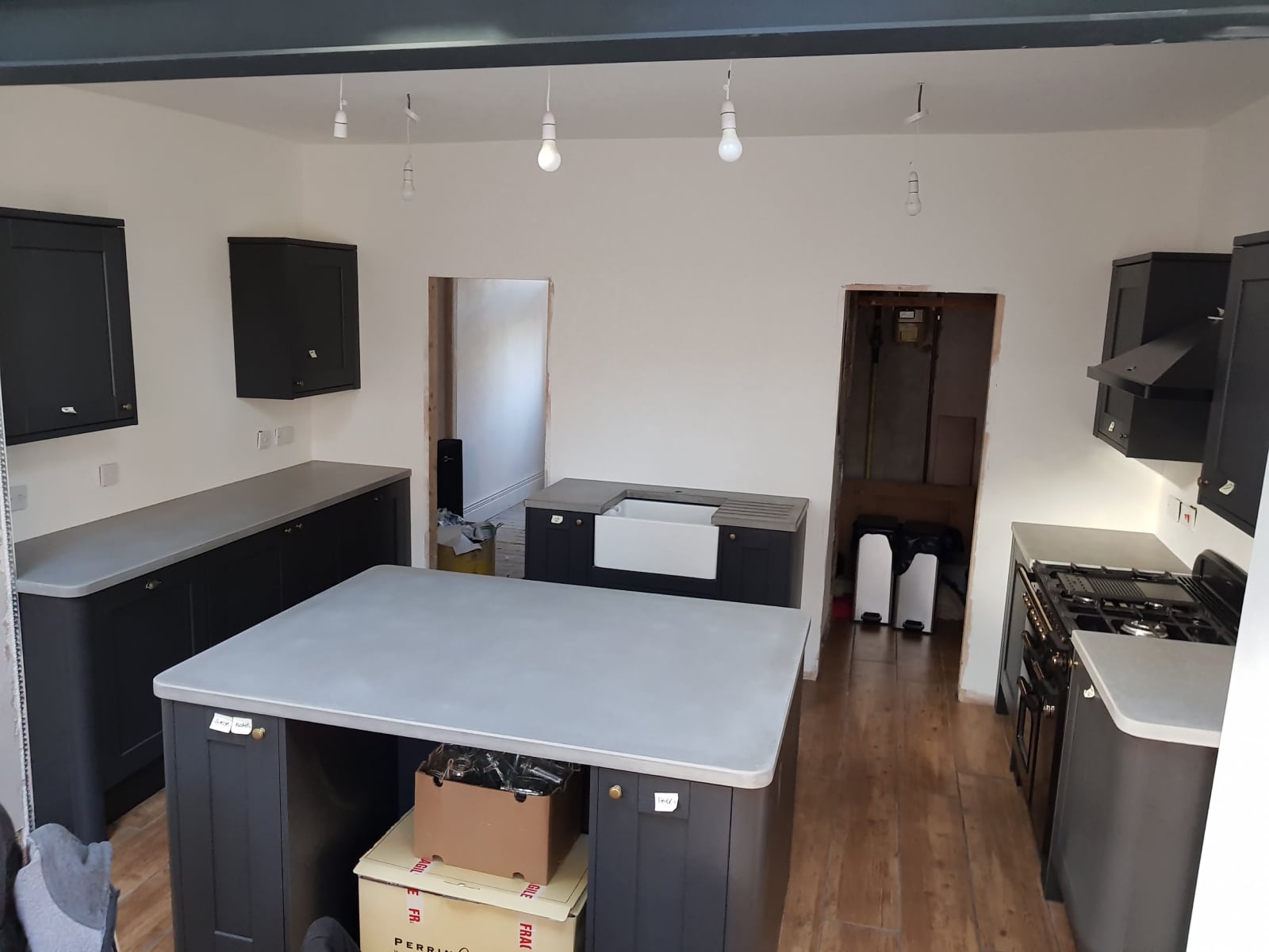 Light grey kitchen concrete worktop and island fitted in LondonLondon E10
