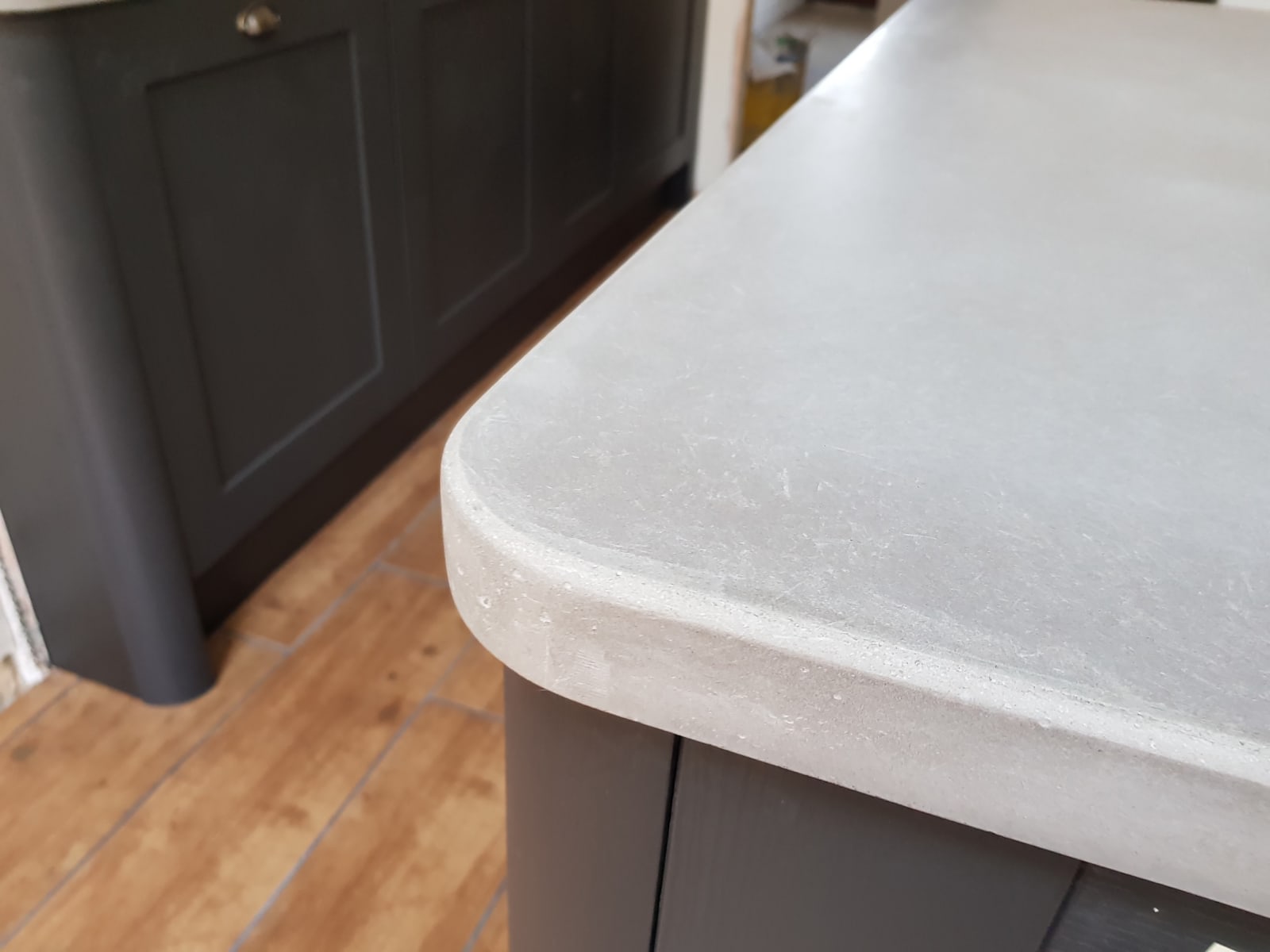 Light grey kitchen concrete worktop and island fitted in LondonLondon E10