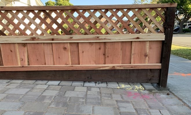 15 Fence on a Slope Ideas for Your Backyard | Ergeon