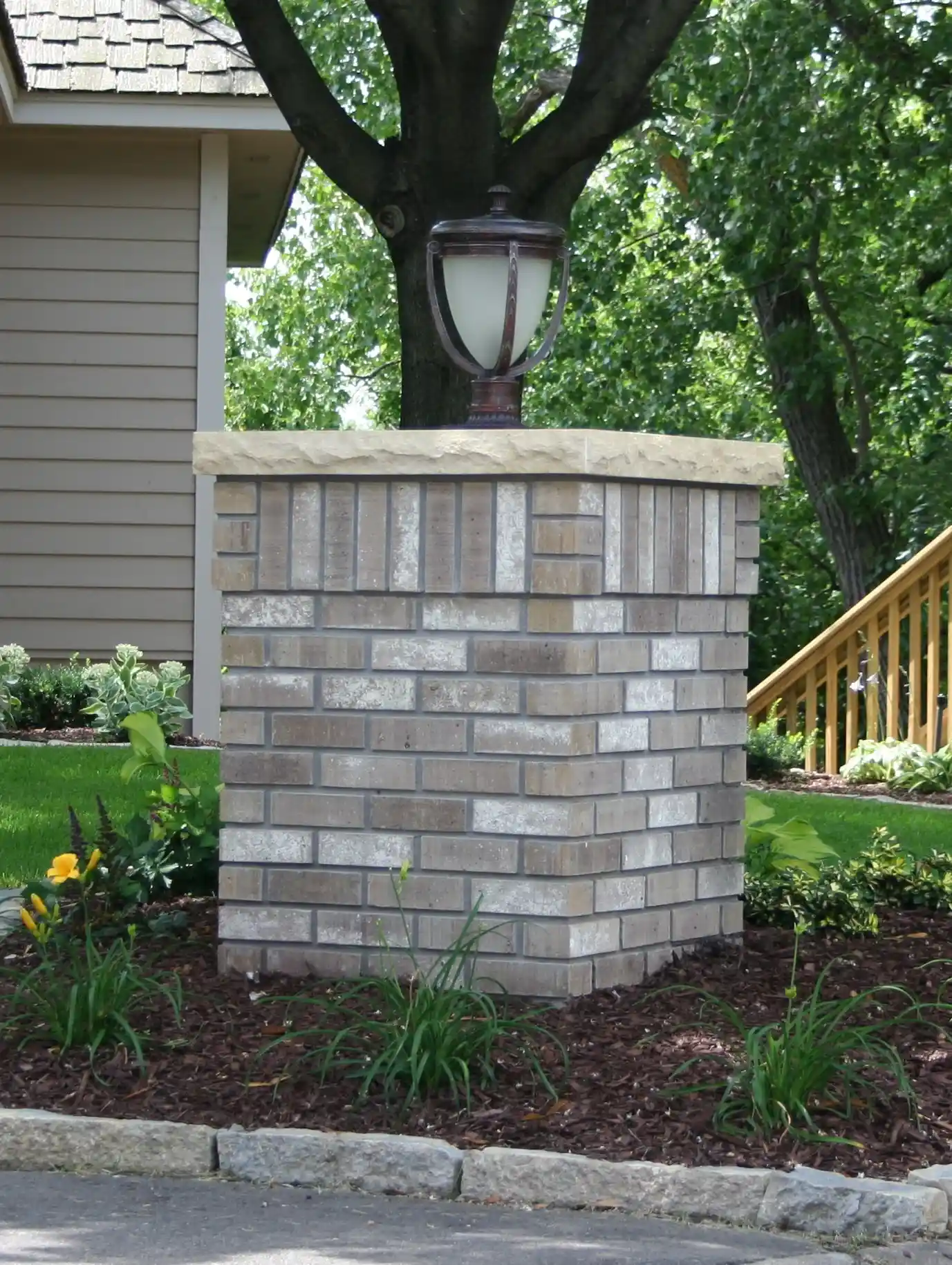 Brick Pillar with Light by Minnesota Landscapes